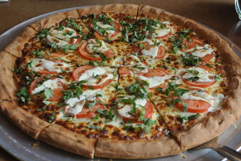 Where To Find Mouthwatering Colorado-Style Pizza in Denver - American Eats